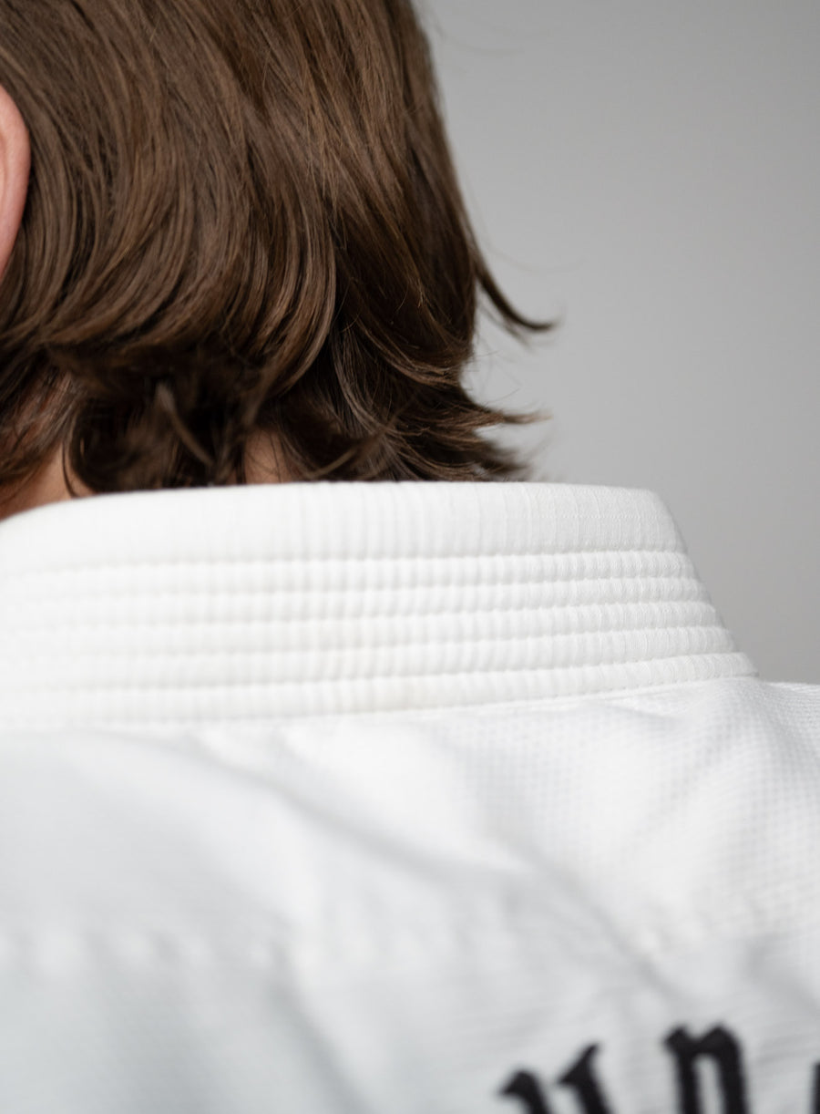 ThruDark X REORG Gi “No Quarter Given” | White Brazilian Jiu-Jitsu Gi